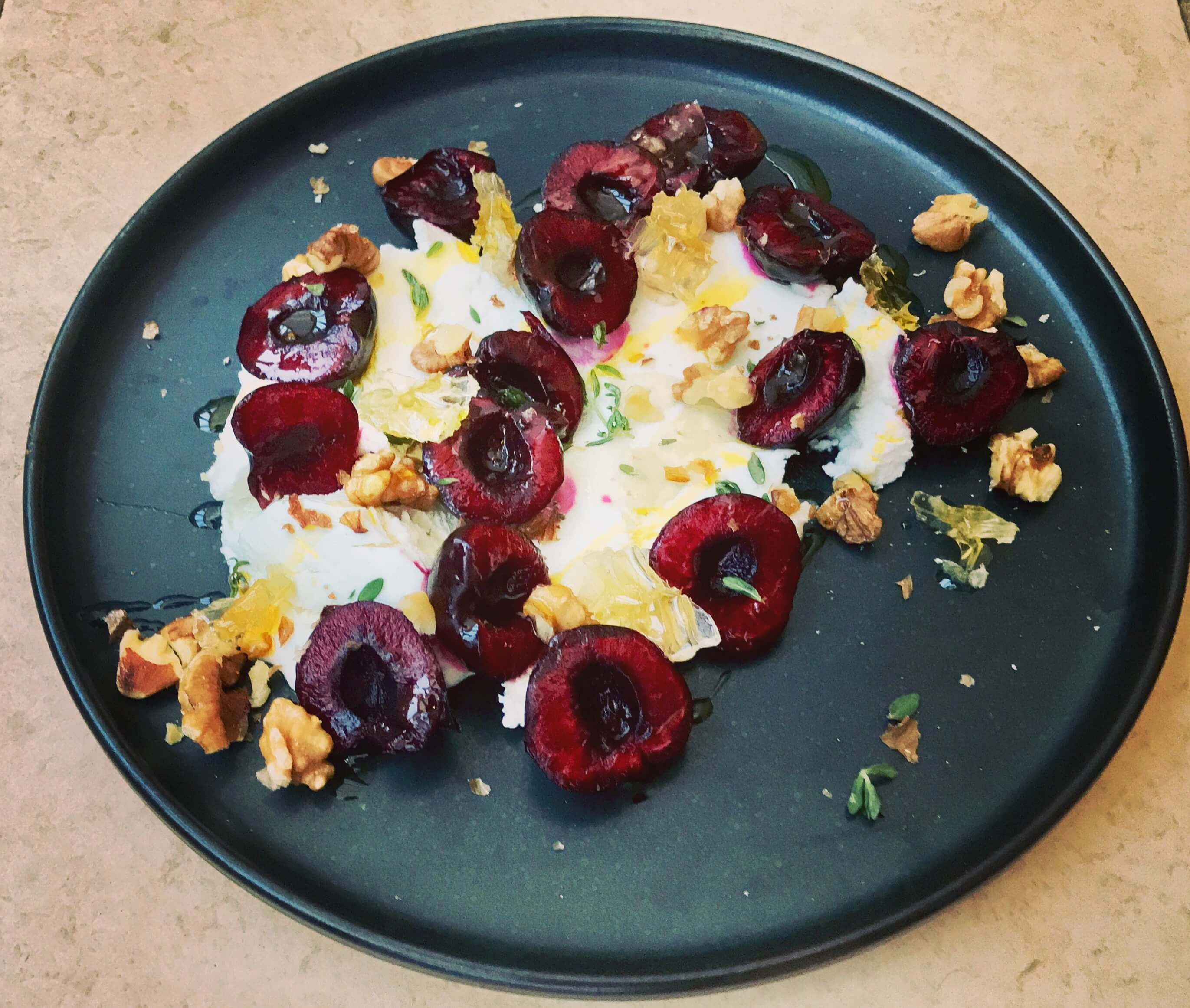 Goat curd with cherries and honeycomb